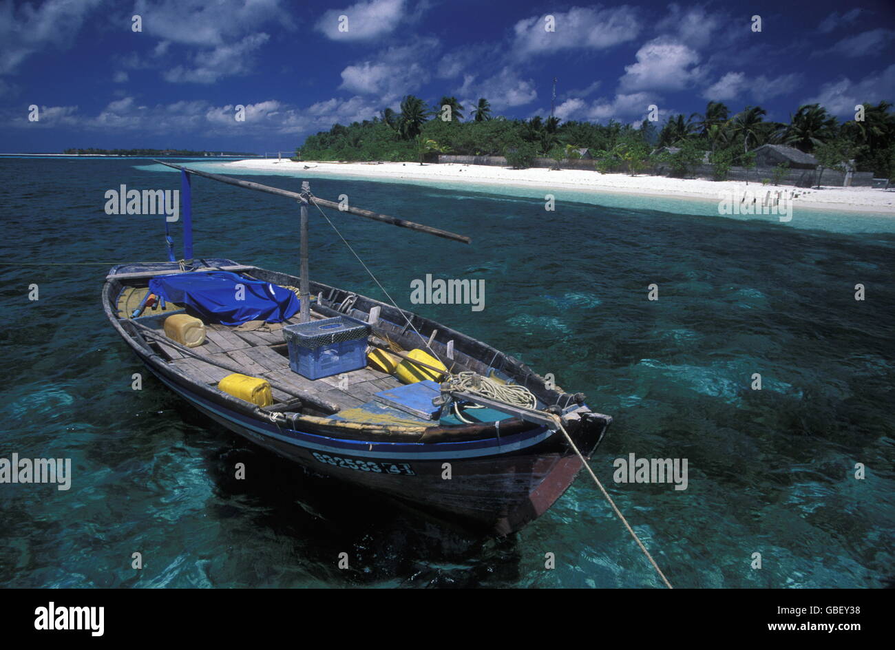 a dhoni Boat on the coast of the island and atoll of the Maldives ...