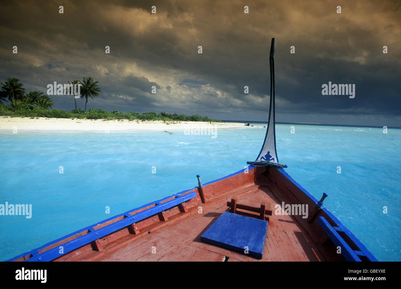 a dhoni Boat on the coast of the island and atoll of the Maldives ...