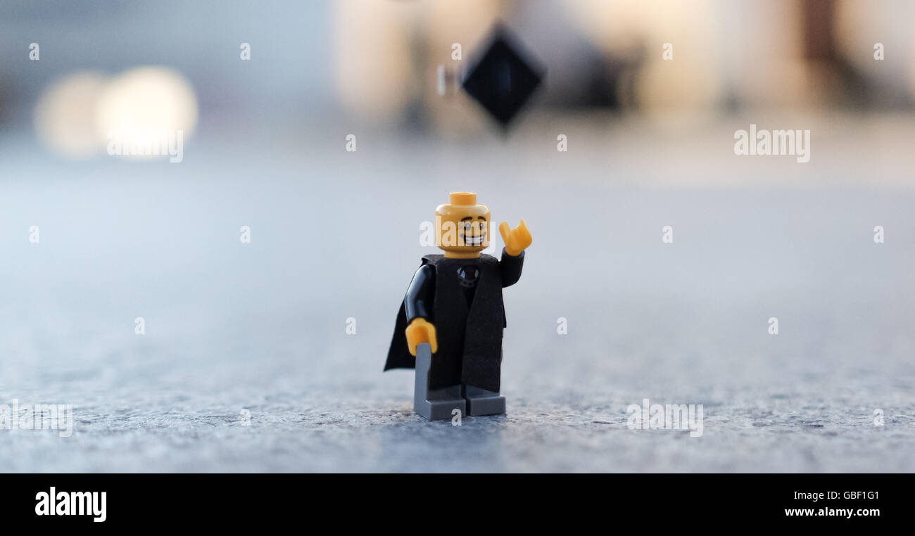 Graduation Lego man throwing hat in air Stock Photo - Alamy