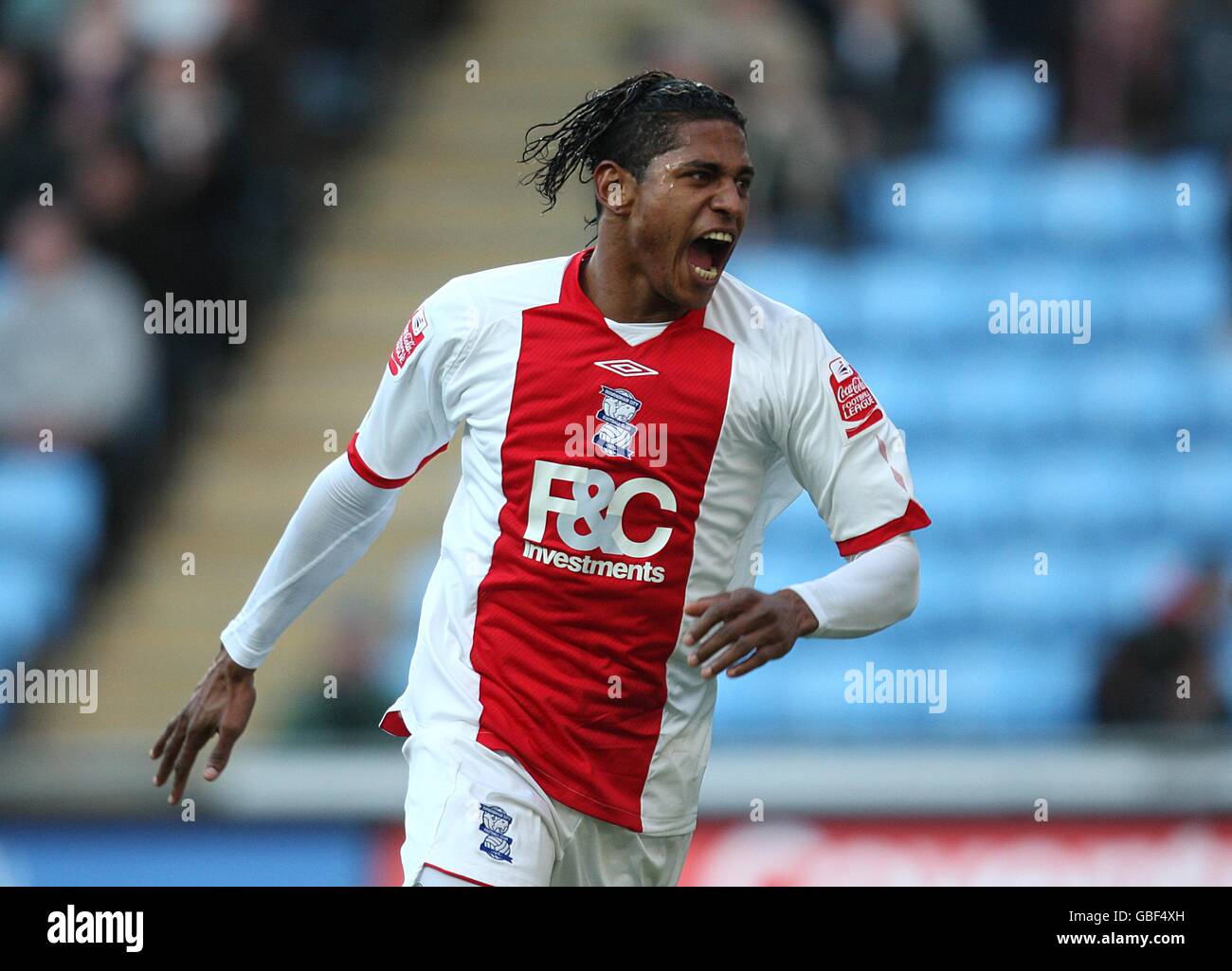 Birmingham City's Carlos Costly celebrates as he thinks teammate Scott ...