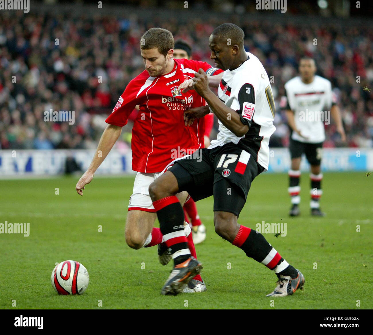 Barnsley's Stephen Foster and Charlton Athletic's Chris Dickson during ...