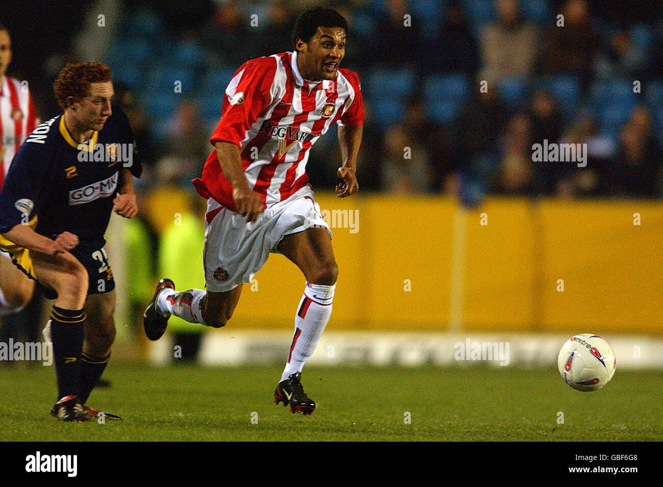 Sunderlands matthew piper escapes the attentions of wimbledons dean ...