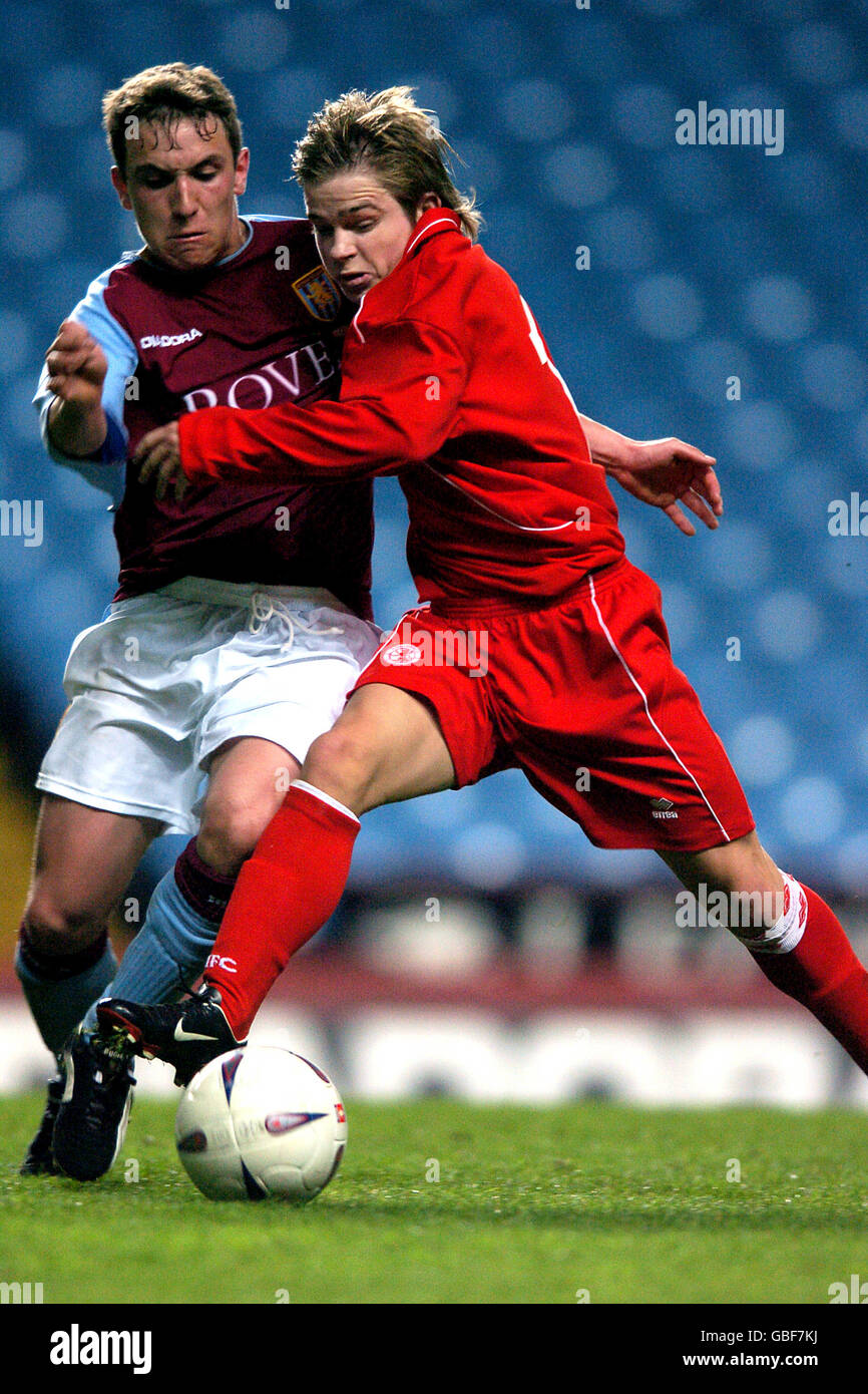 Aston villas steven foley tackles middlesbroughs anthony peacock hi-res ...