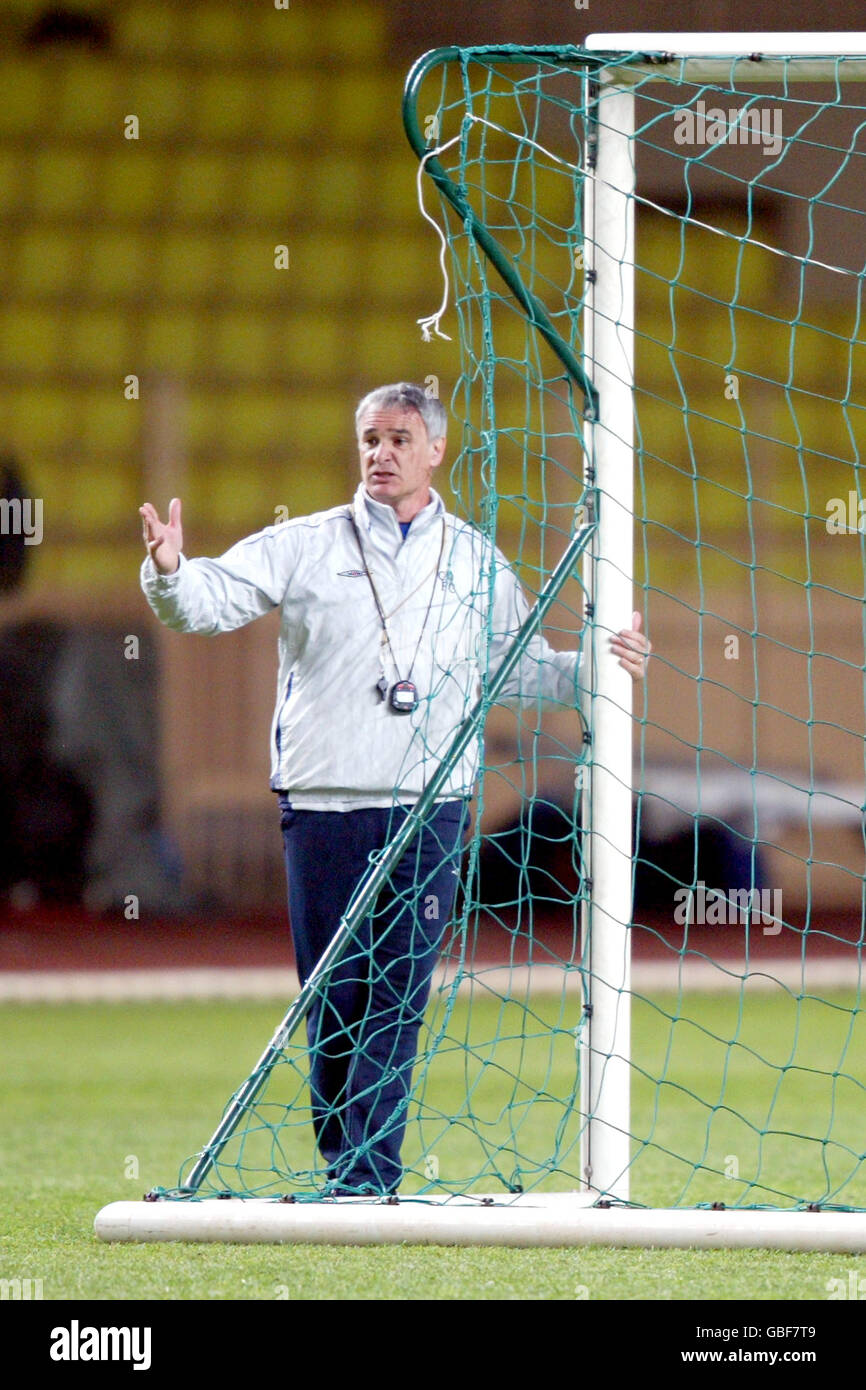 Chelsea manager Claudio Ranieri moves the goalposts before training ...