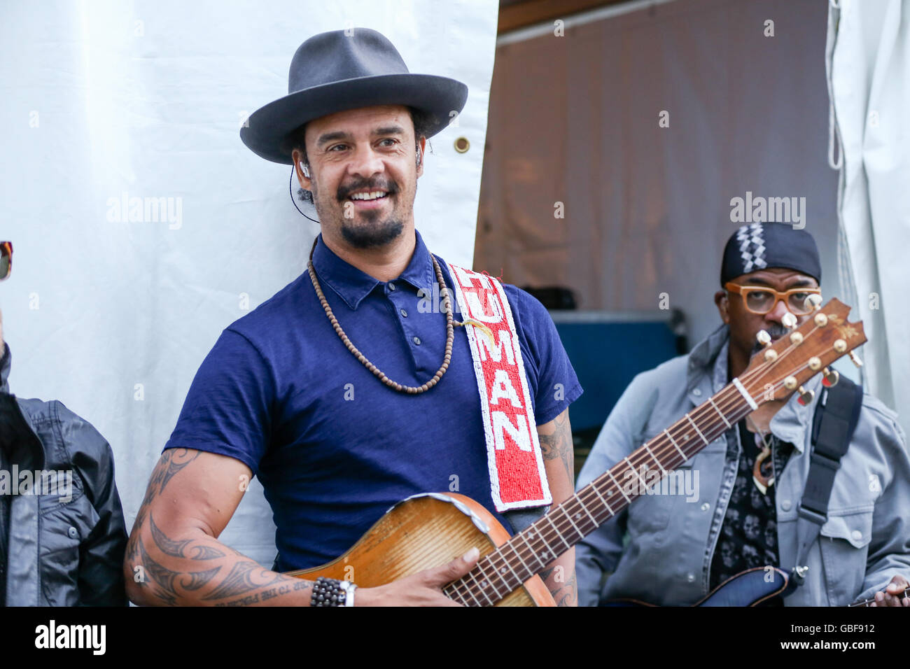 TORONTO, CANADA - JULY 1, 2016: Two young girls sing with Musician ...
