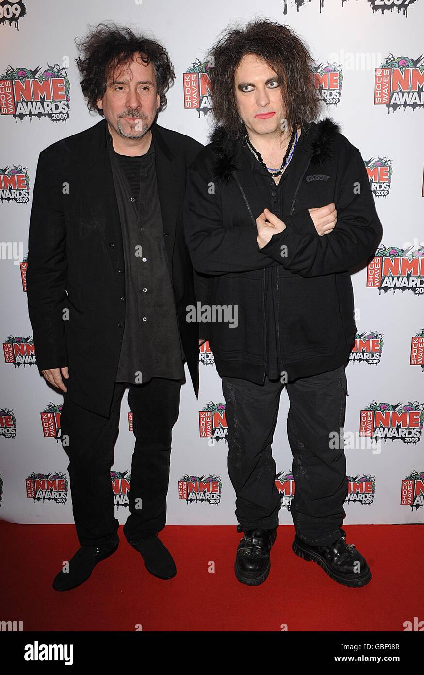 Director Tim Burton (left) and Robert Smith of The Cure arriving for ...