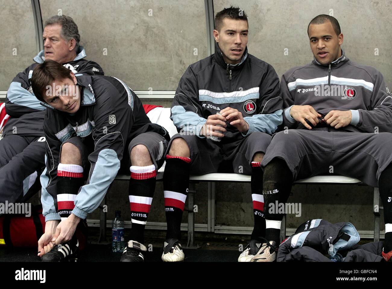(left to right) Charlton Athletic's doctor John Fraser, Matthew Holland ...