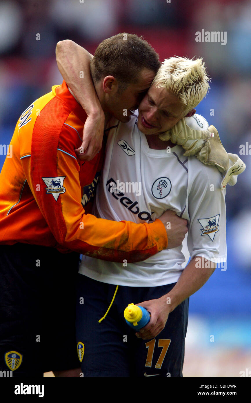 Leeds United's Alan Smith (r) and goalkeeper Paul Robinson stand crying ...