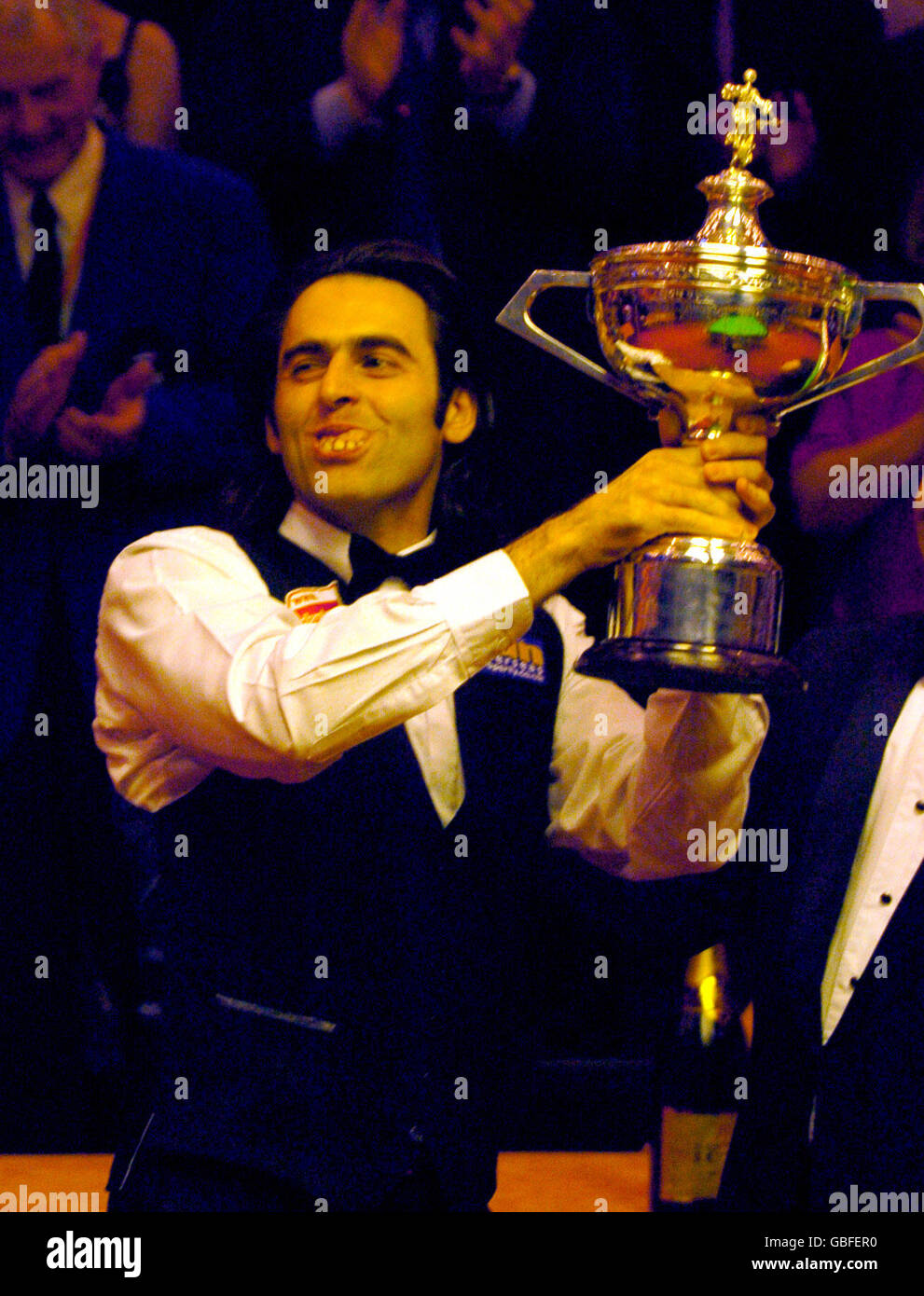 Ronnie O'Sullivan celebrates his 18-8 victory over Graeme Dott Stock ...