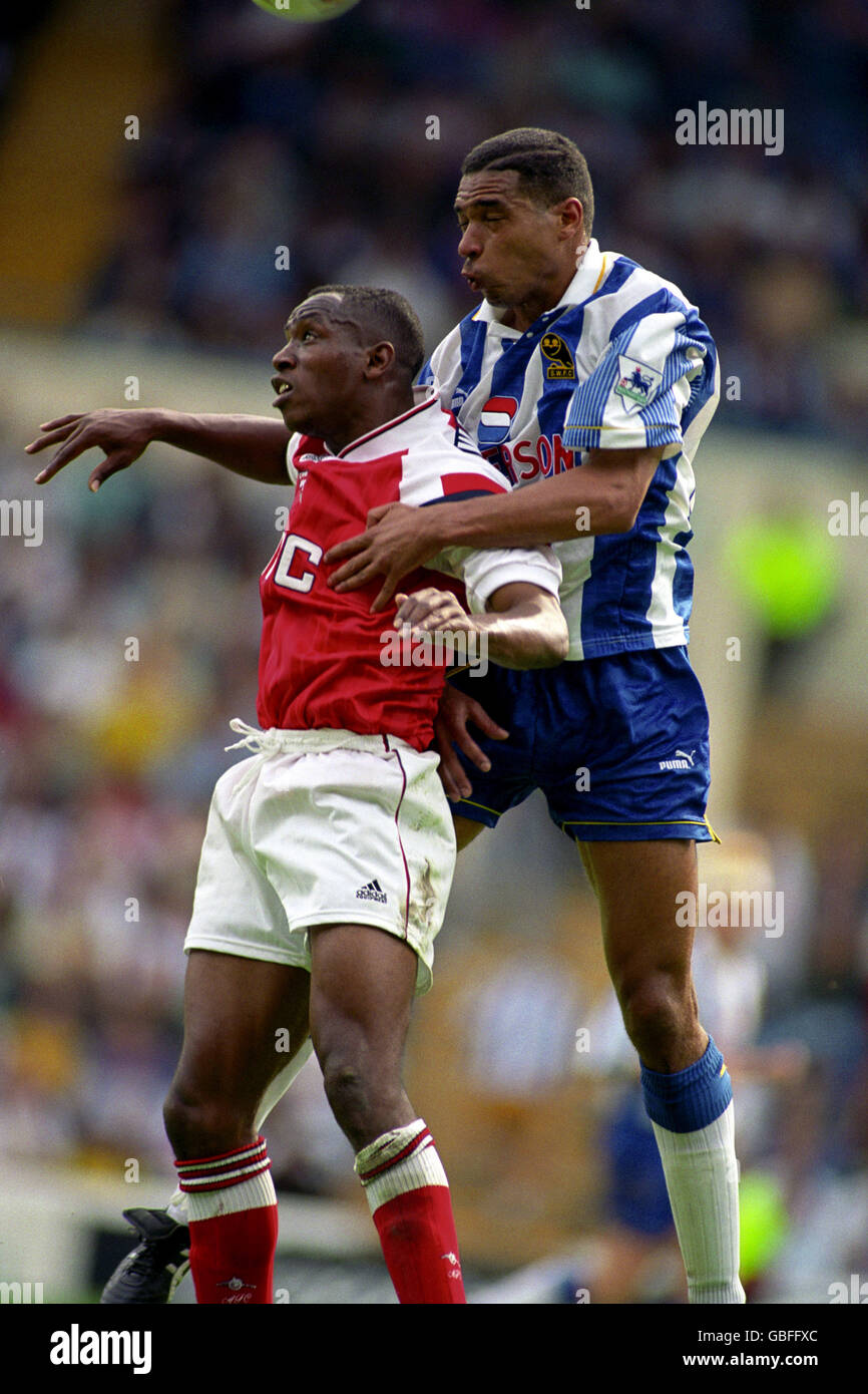 DES WALKER, SHEFFIELD WEDNESDAY HEADS THE BALL AWAY FROM IAN WRIGHT ...