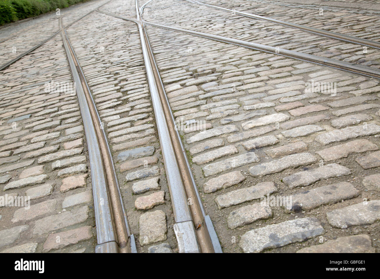 Tram Tracks on Cobble Stone Street Stock Photo - Alamy