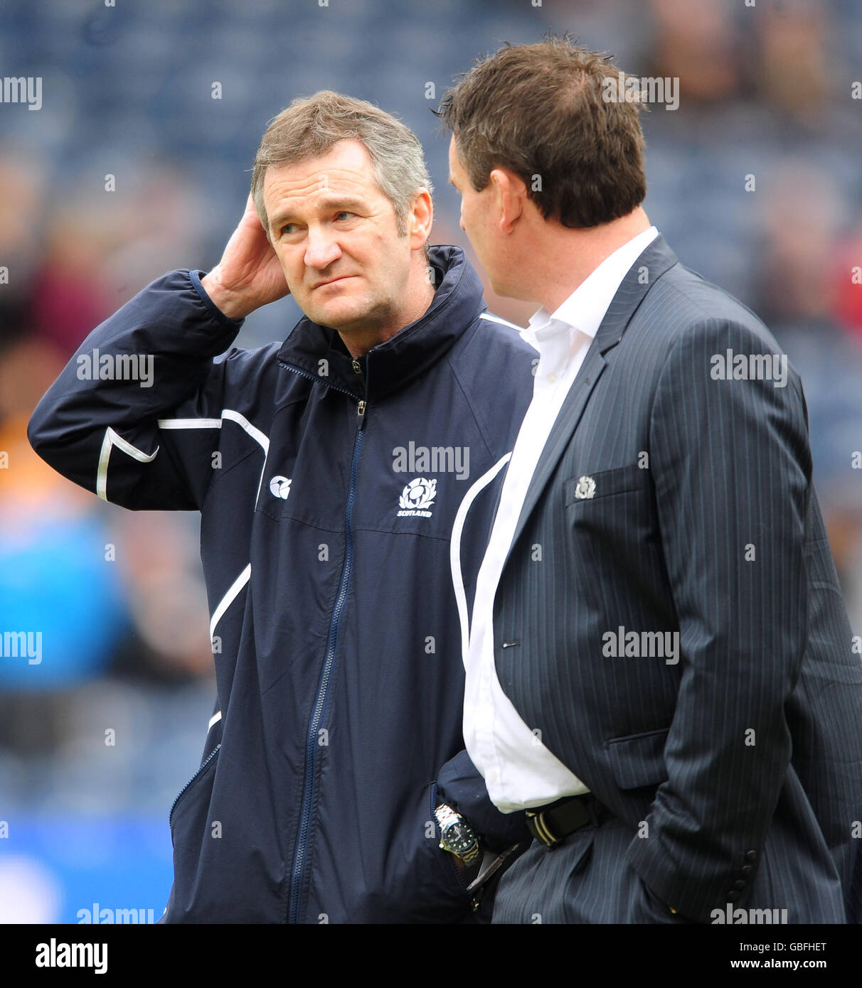 Scotland head coach Frank Hadden (left) talks to forwards coach Mike ...