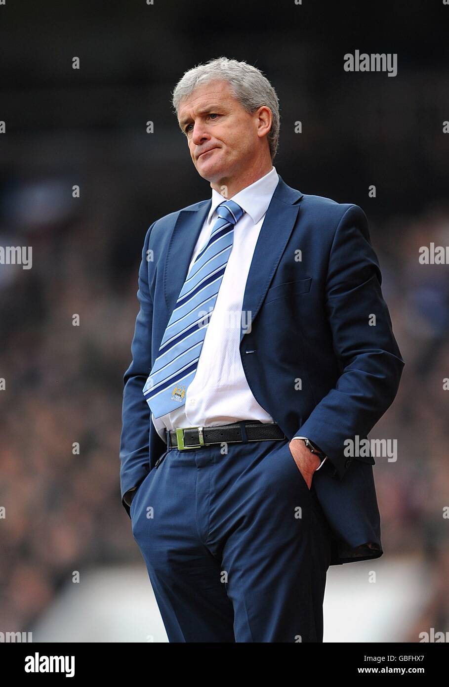 Manchester city manager mark hughes on touchline hi-res stock ...