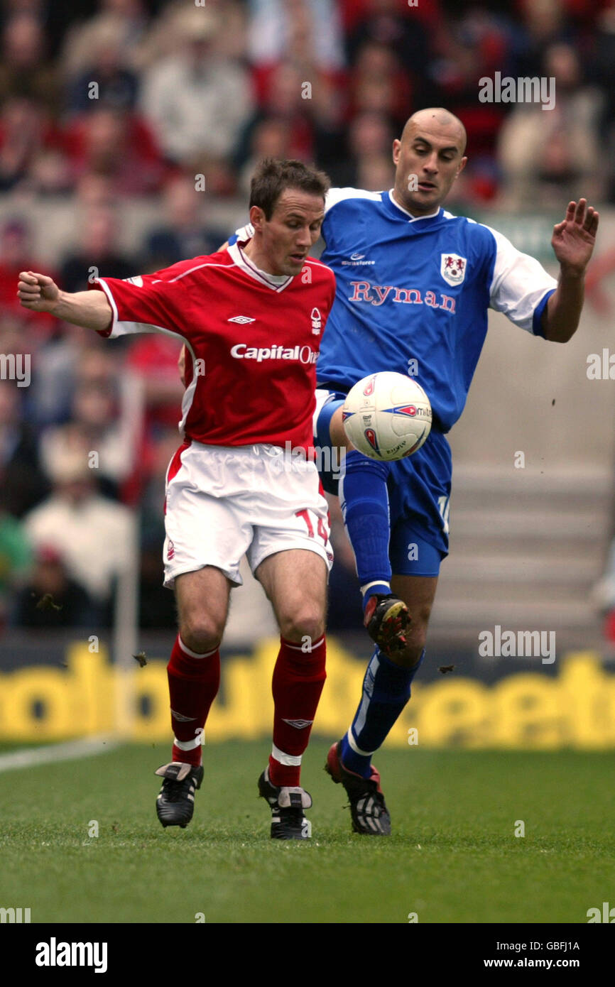 Nottingham Forest's Eion Jess (l) and Millwall's Daniel Dichio (r ...