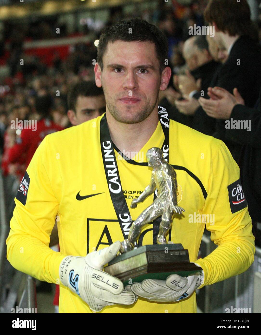 Manchester United goalkeeper Ben Foster with the man of the match award ...