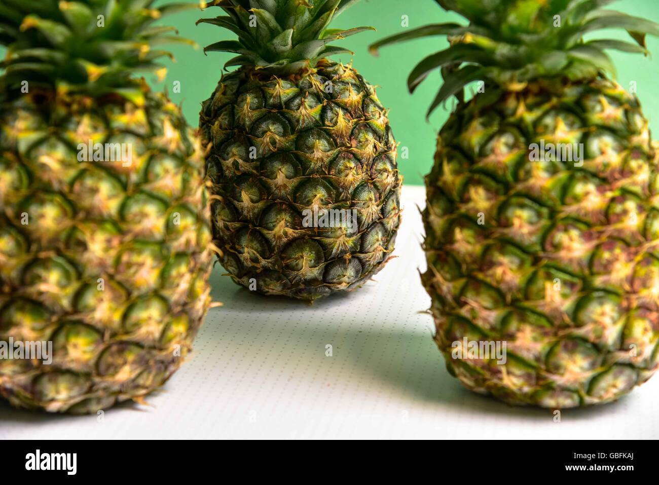 Group of Fresh Pineapples Stock Photo - Alamy