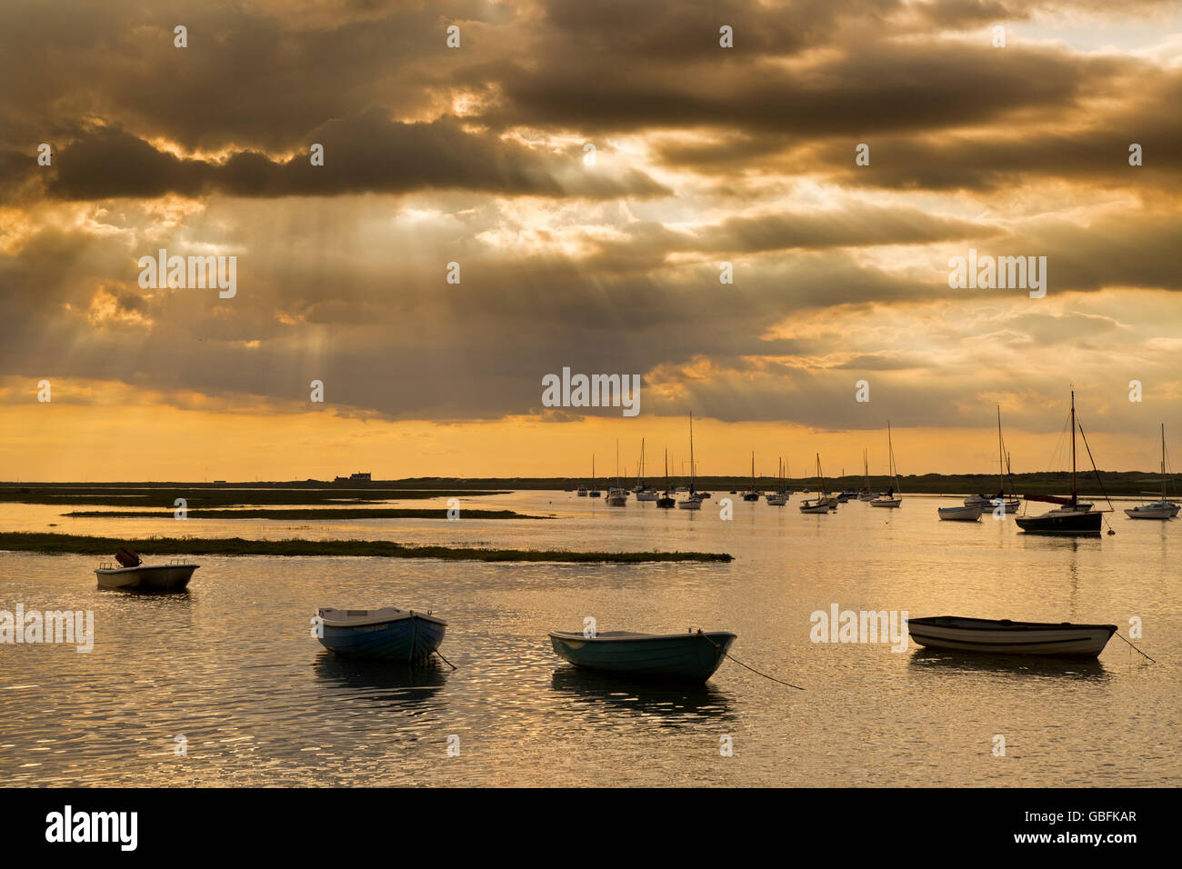 Fishing Boats in Brancaster Staithe harbour at high tide on a calm ...