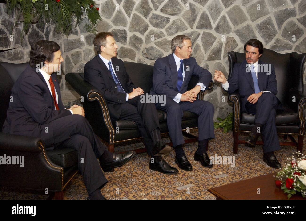 U.S. President George W. Bush listens to Spanish Prime Minister Jose ...