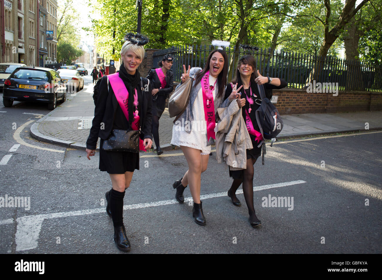 Hen party making their way along Wapping High Street for their big ...