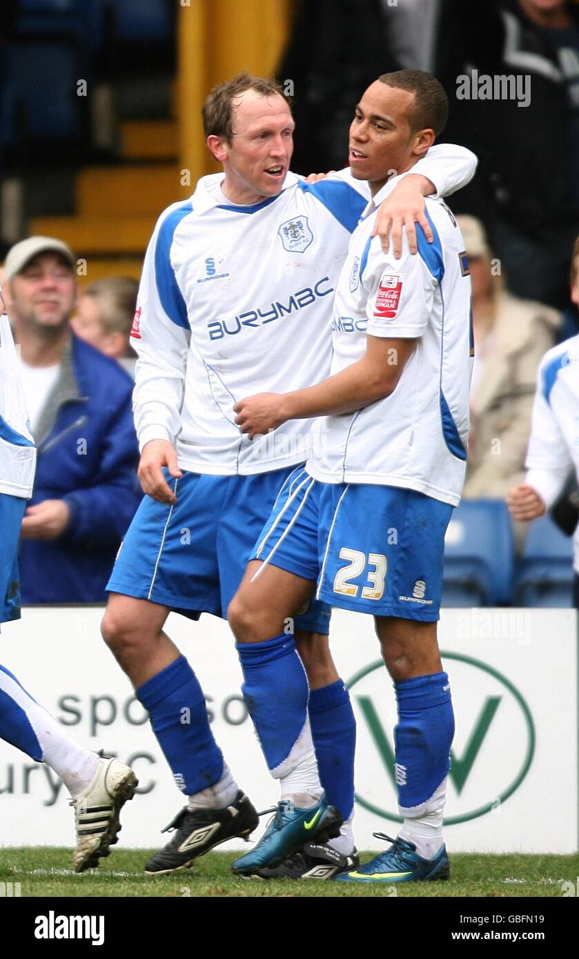 Bury's Elliott Bennett (left) celebrates scoring the opening goal Stock ...