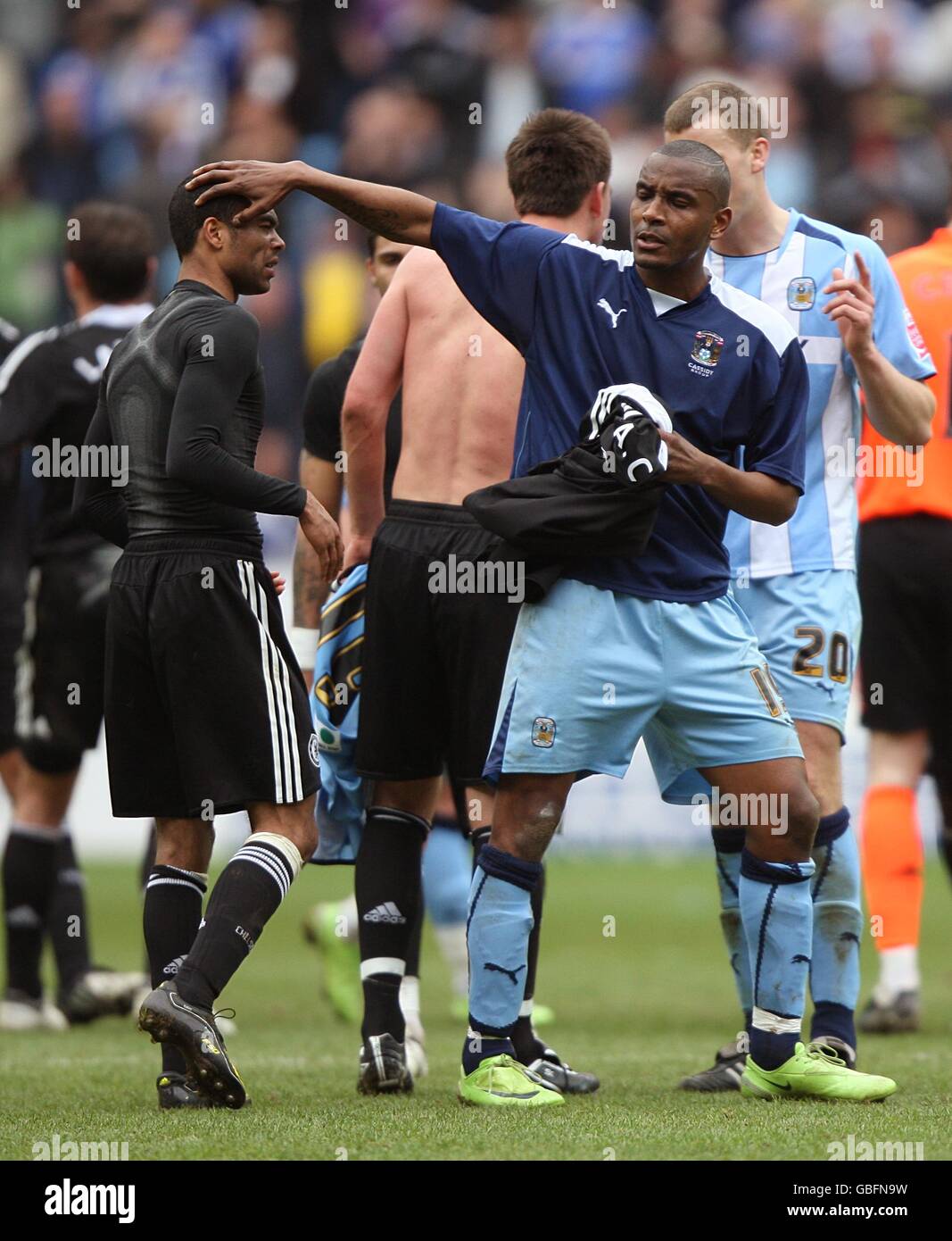 Coventry City's Clinton Morrison (left) congratulates Chelsea's Ashley ...