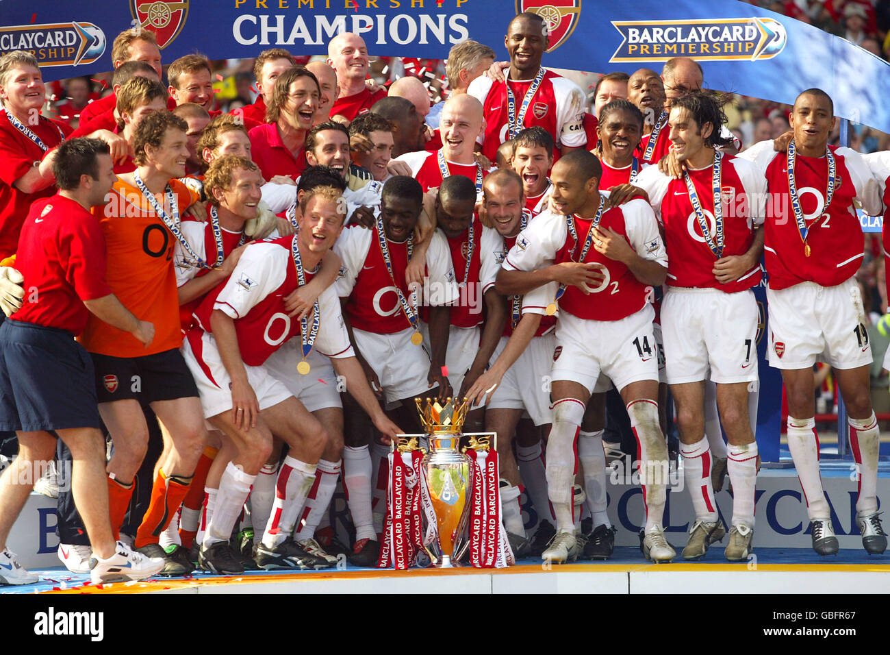 Arsenal players celebrate with the FA Barclaycard Premiership trophy ...