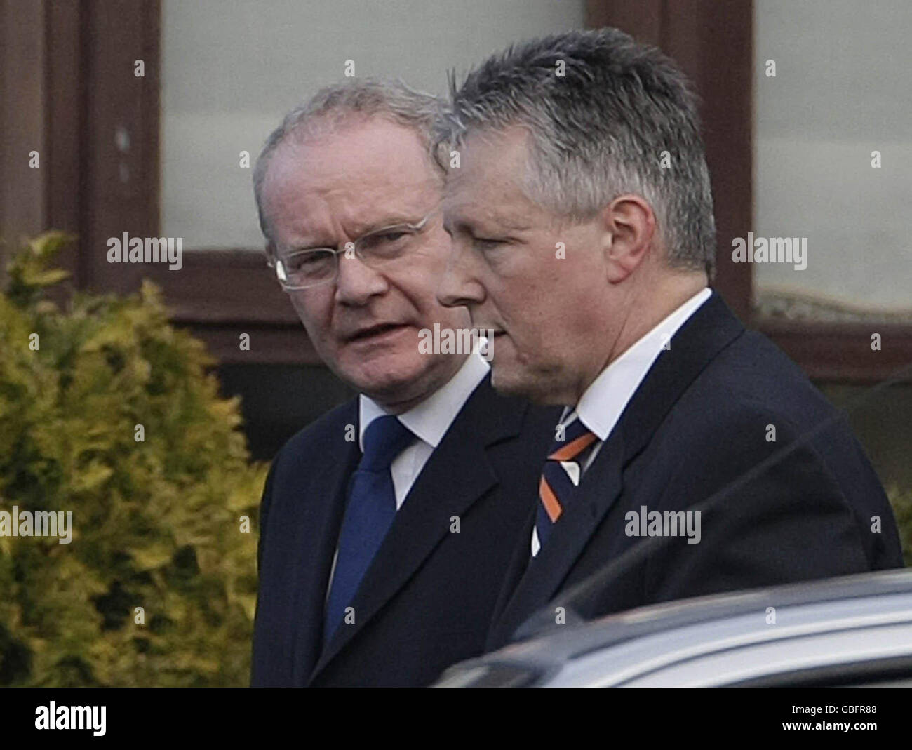 Northern Ireland First Minister Peter Robinson (front) and Deputy First ...