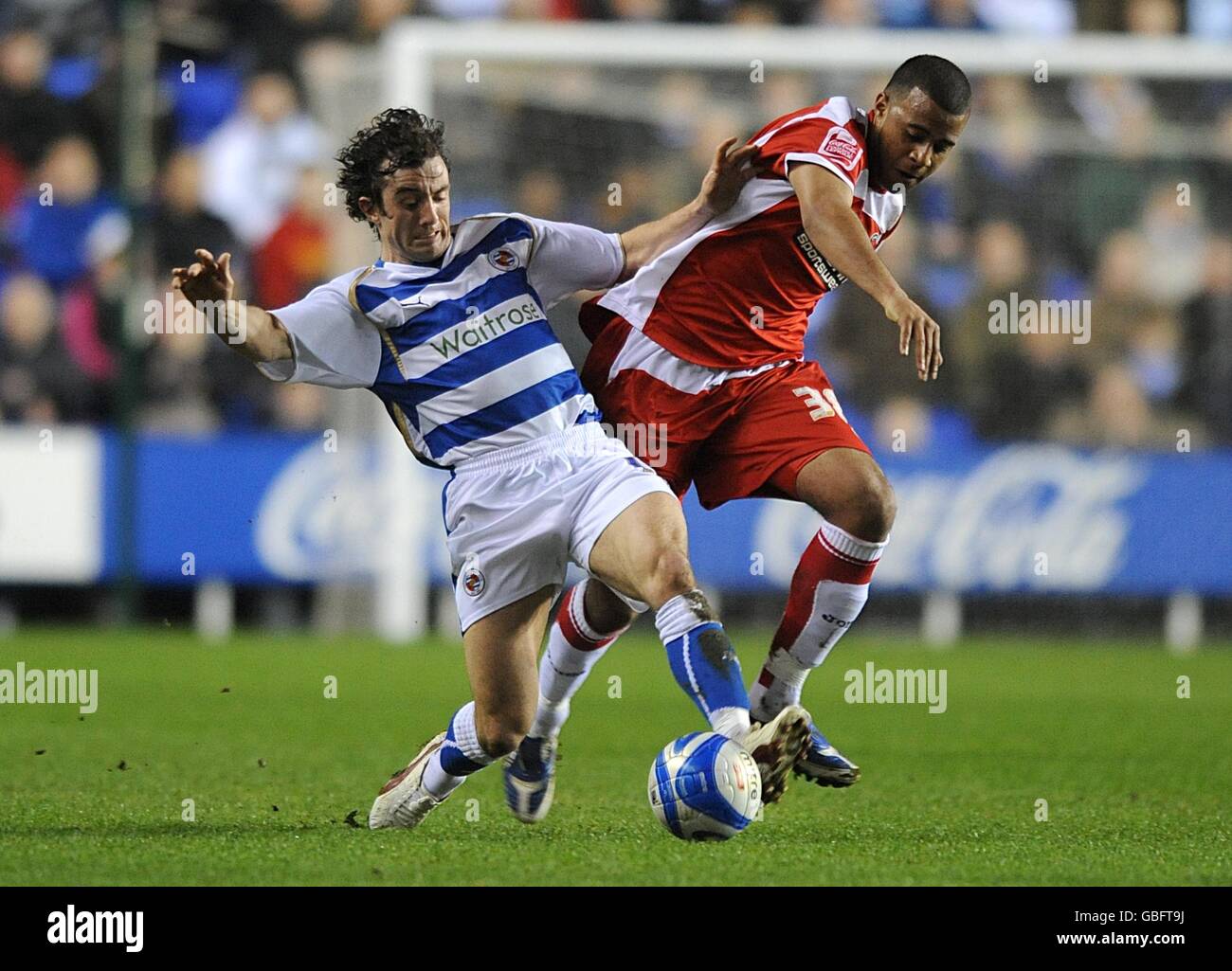 Reading's Stephen Hunt (left) and Charlton Athletic's Tom Soares battle ...