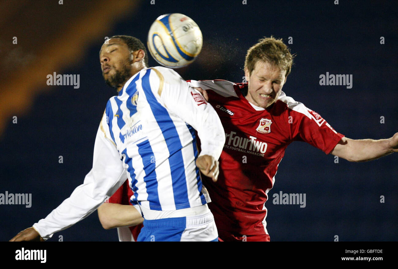 Colchester's Clive Platt and Swansea's Jamie Vincent during the Coca ...