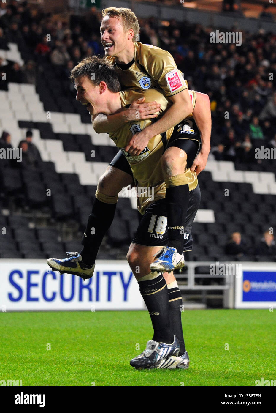 Huddersfield towns andy butler celebrates his goal with tom clarke hi ...