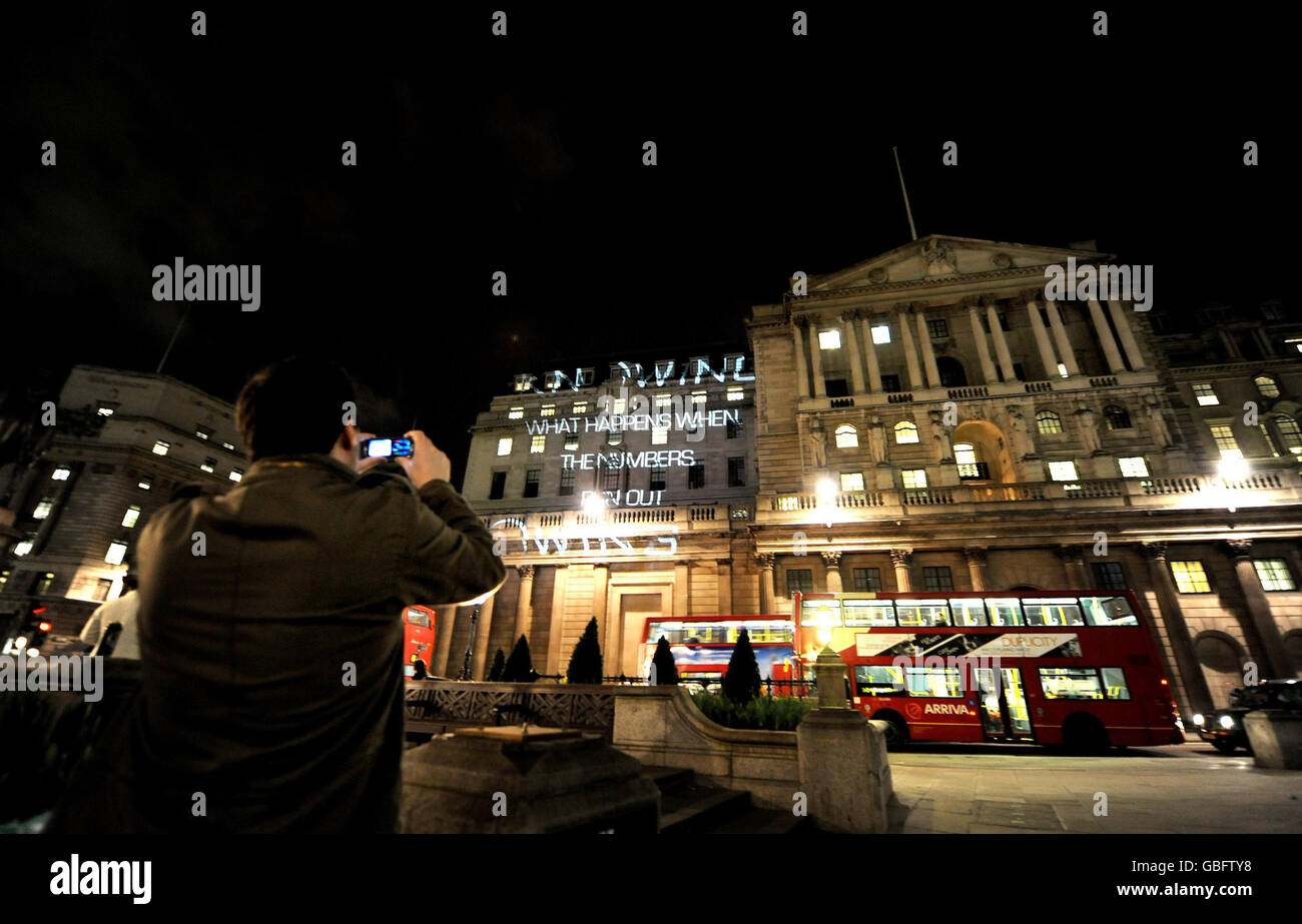 The words 'What happens when the numbers run out' are projected onto ...