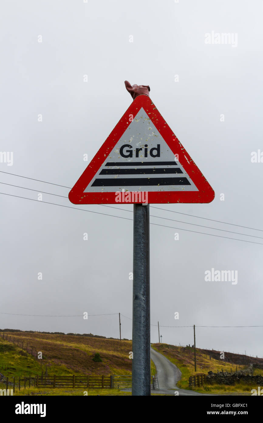 United Kingdom triangular road warning sign Cattle Grid Stock Photo - Alamy