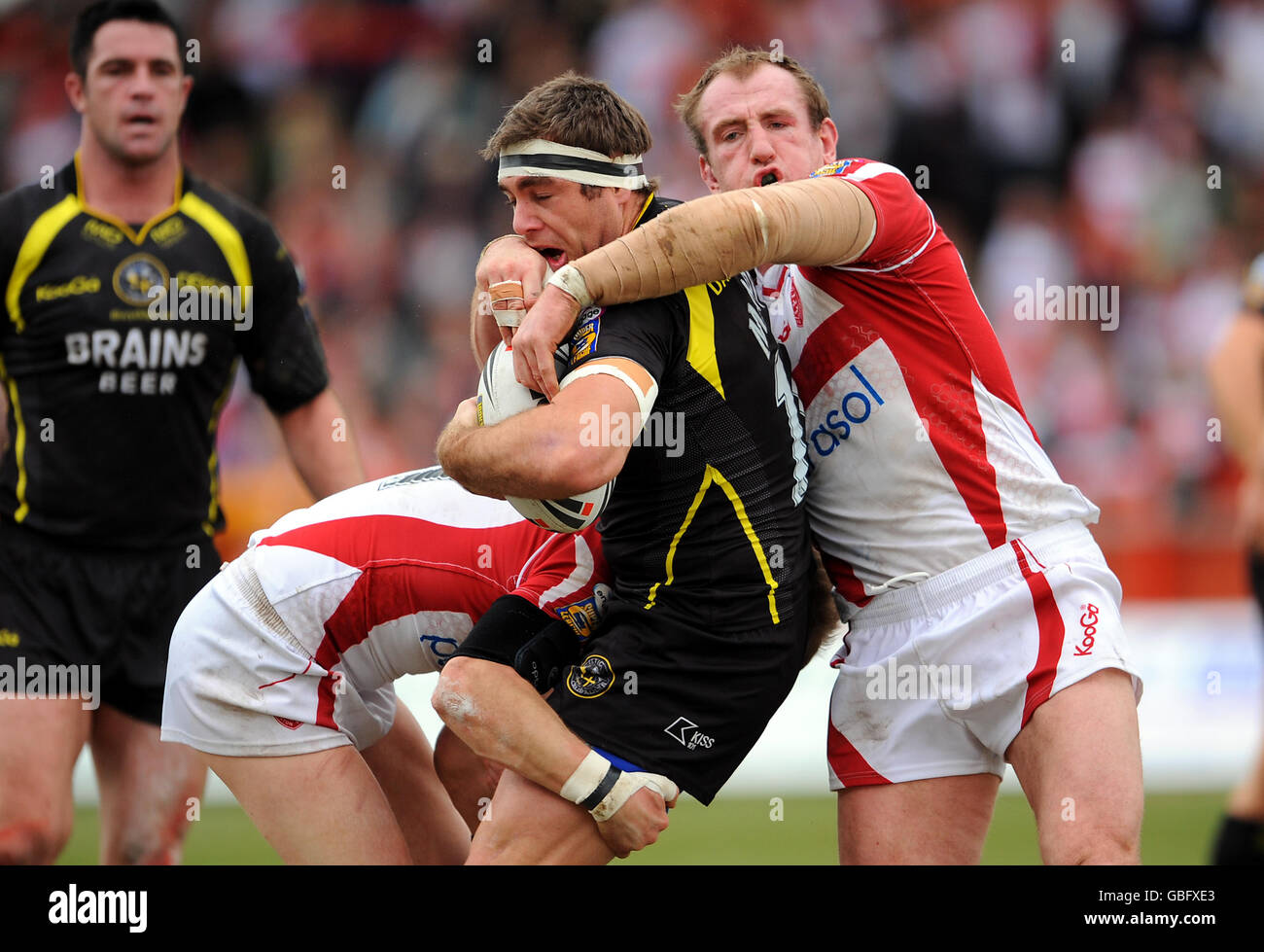 Hull Kingston Rovers' Nick Fozzard tackles Celtic Crusaders' Darren ...