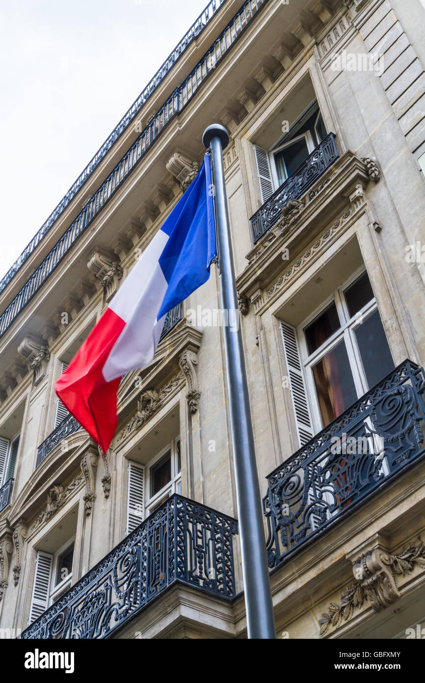 Red, White and Blue French flag in street. Paris, France Stock Photo ...