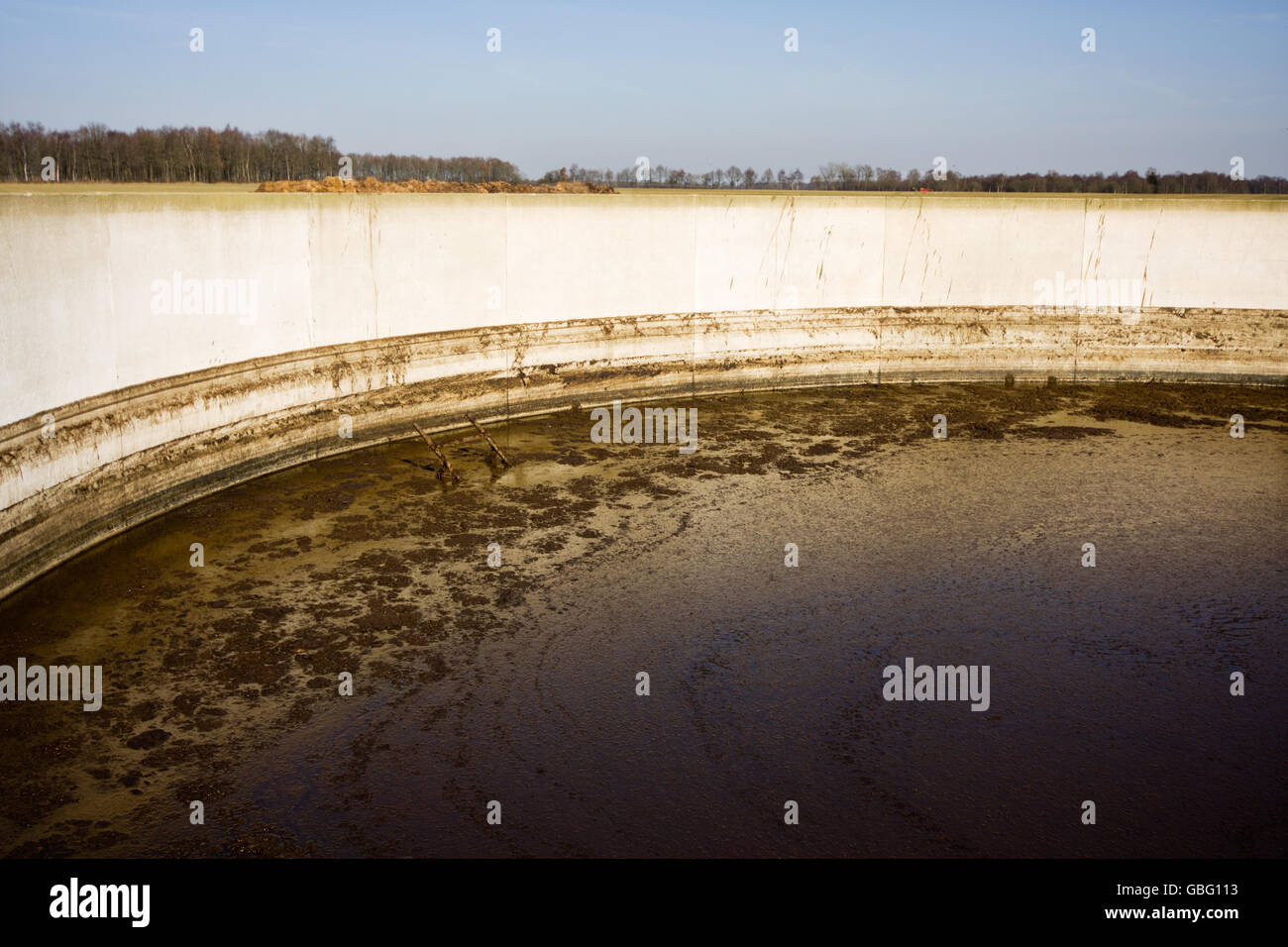 Manure storage tank Stock Photo - Alamy