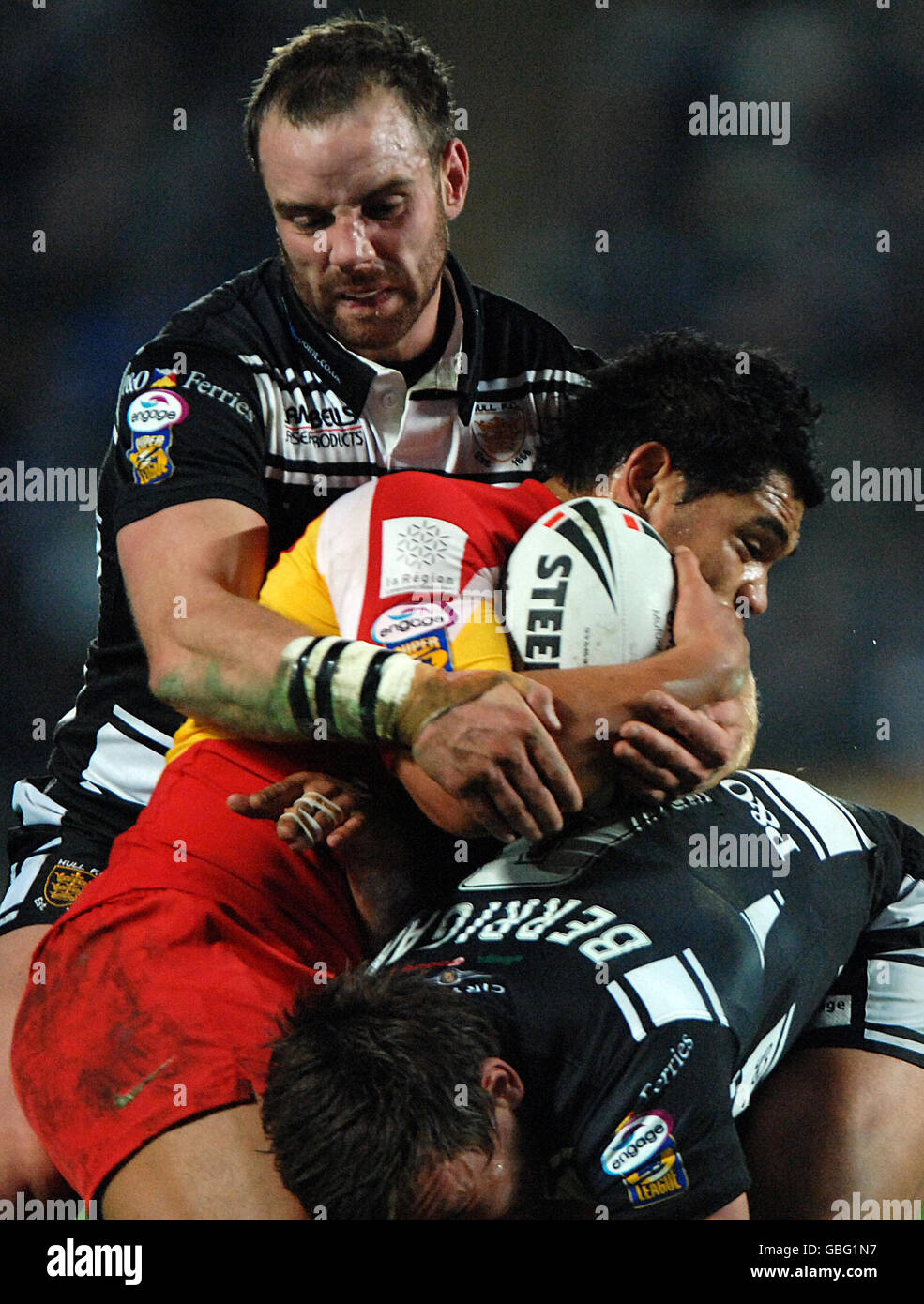 Hull FC's Shaun Berrigan (below) and Ewan Dowes combine to tackle ...