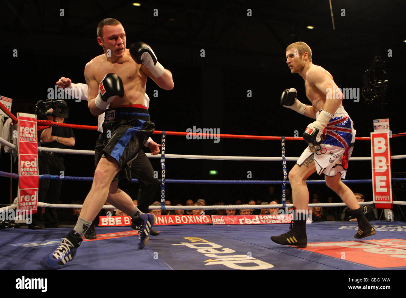 Great Britain's Tony Jeffries (right) goes on the offensive against ...