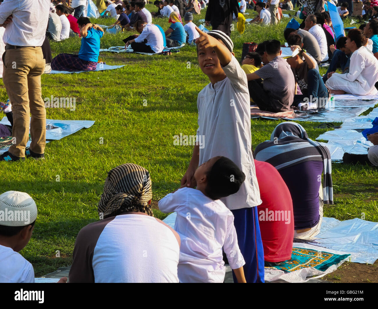 Manila, Philippines. 06th July, 2016. A Muslim boy, pointing his finger ...