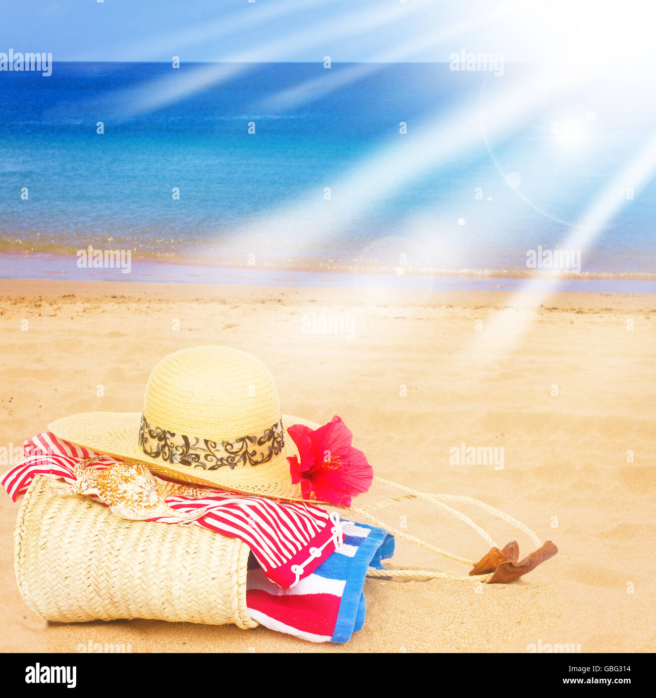 sunbathing accessories at beach Stock Photo - Alamy