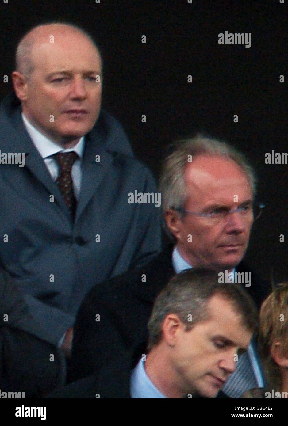 Chelsea's Executive Director Peter Kenyon takes a seat behind England ...