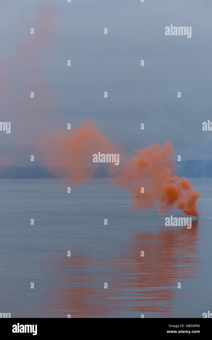 Orange smoke flare hi-res stock photography and images - Alamy