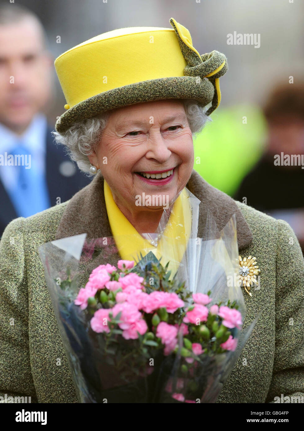 Britains queen elizabeth ii receives flowers hi-res stock photography ...