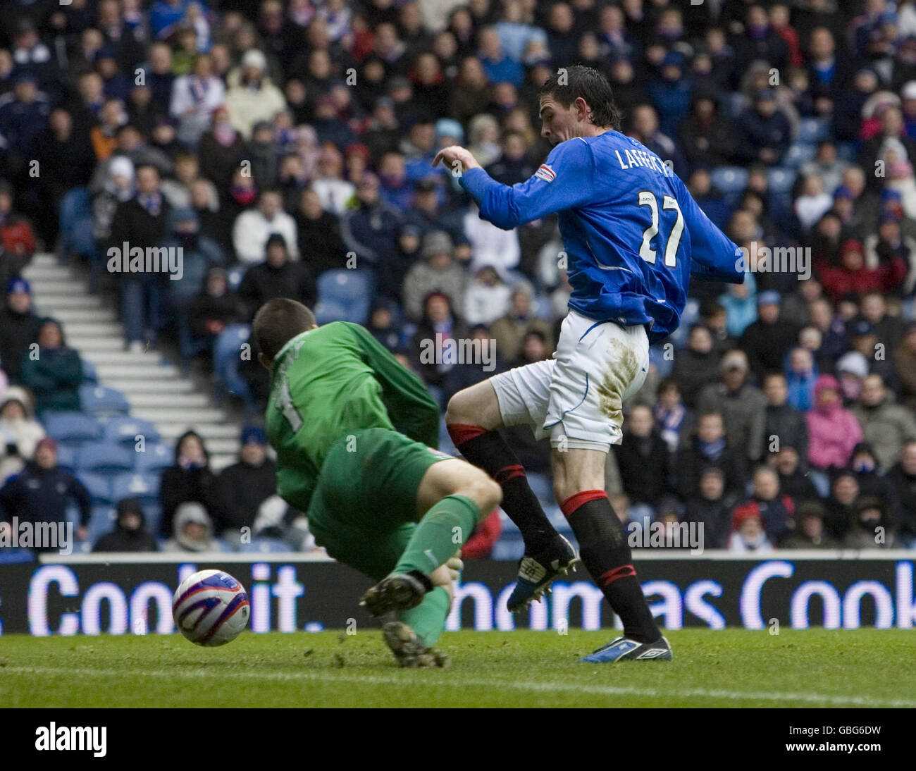 Rangers midfielder Kyle Lafferty gets by Hamilton goalkeeper Tomas ...