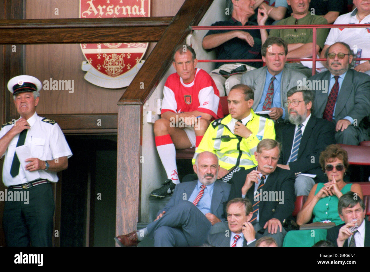Arsenal caretaker manager Stewart Houston sits in the directors' box ...