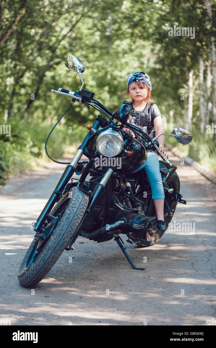 Little girl on a motorcycle Stock Photo - Alamy