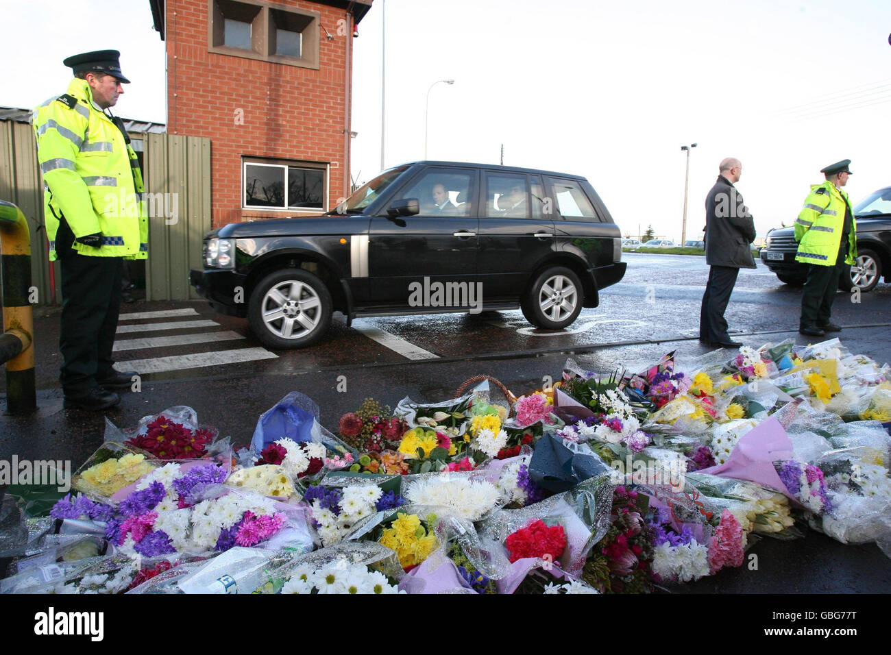 A car carrying Prime Minister Gordon Brown arrives at Massereene ...