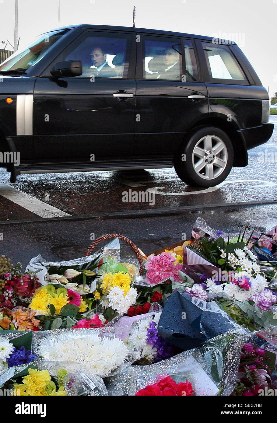 A car carrying Prime Minister Gordon Brown arrives at Massereene ...