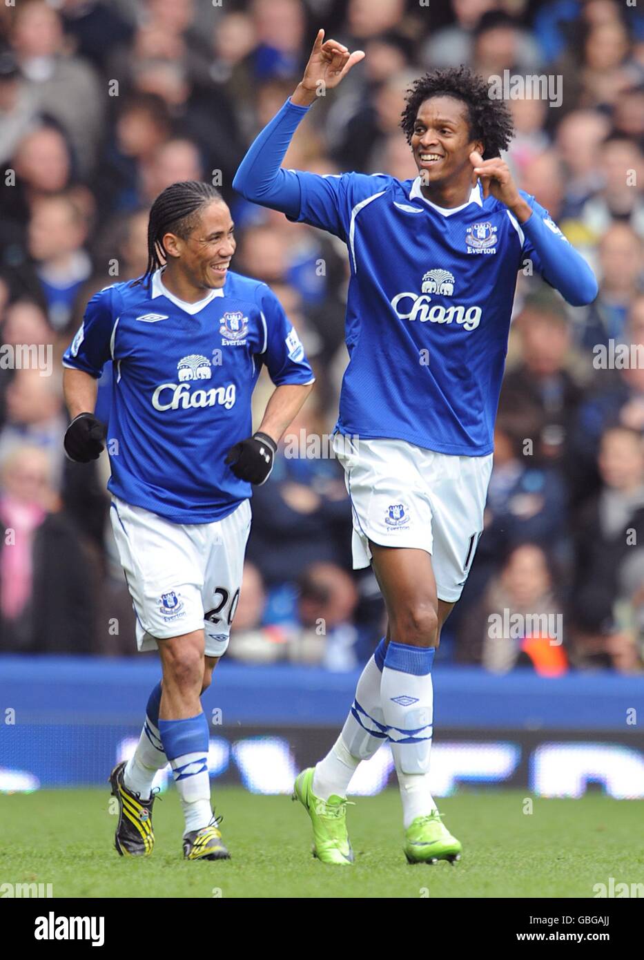Everton's Joao Alves Jo (right) celebrates scoring the opening goal ...