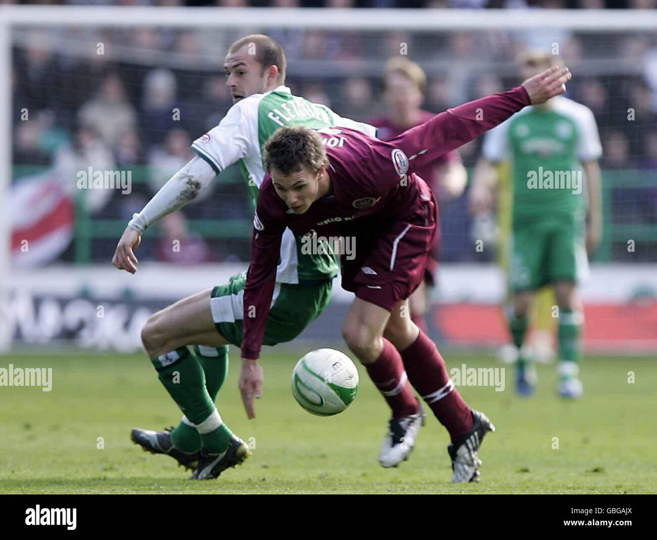 Hibernian's Steven Fletcher (left) and Hearts' Eggert Jonsson battle ...