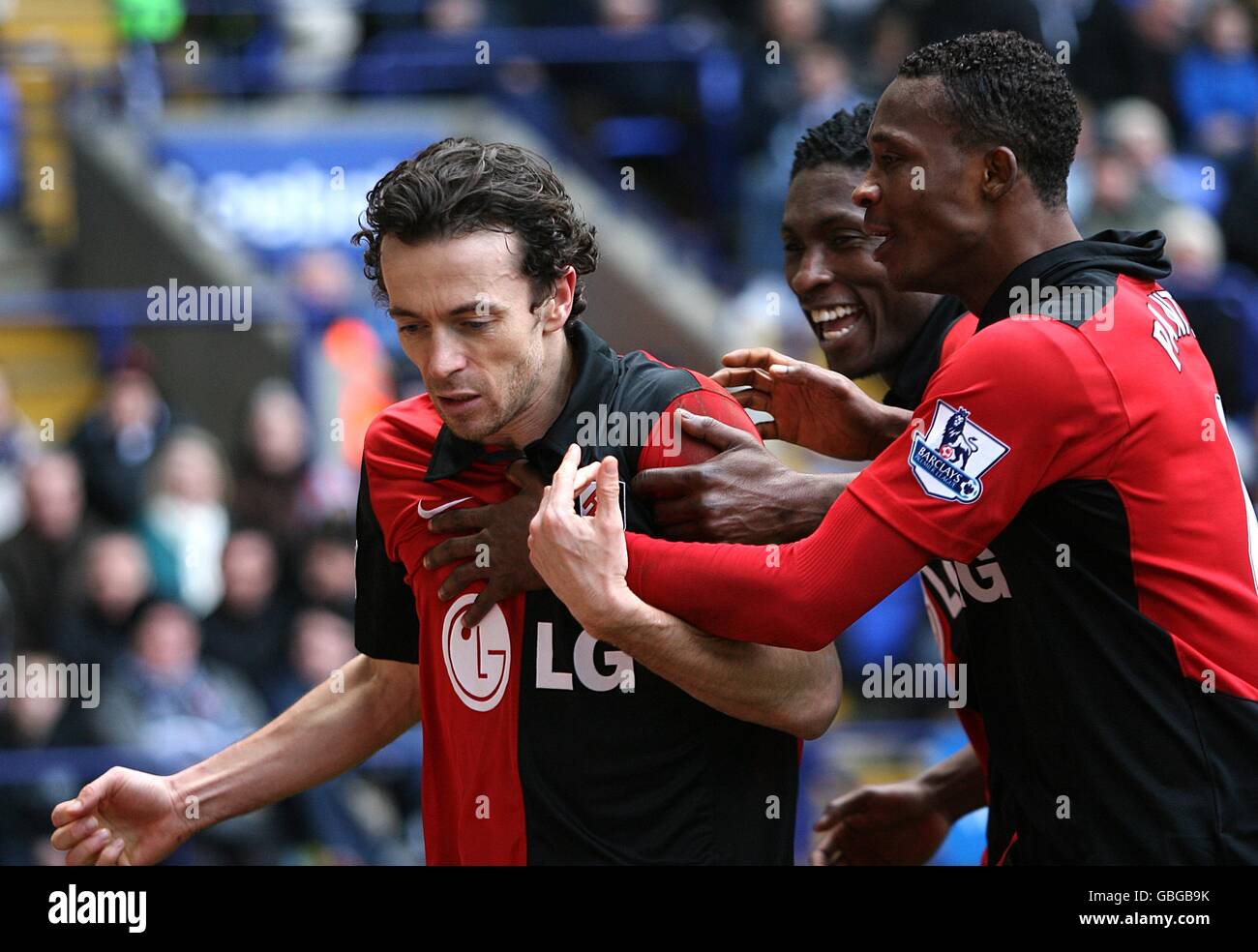 Fulham's Simon Davies (left) celebrates with his team mates after ...